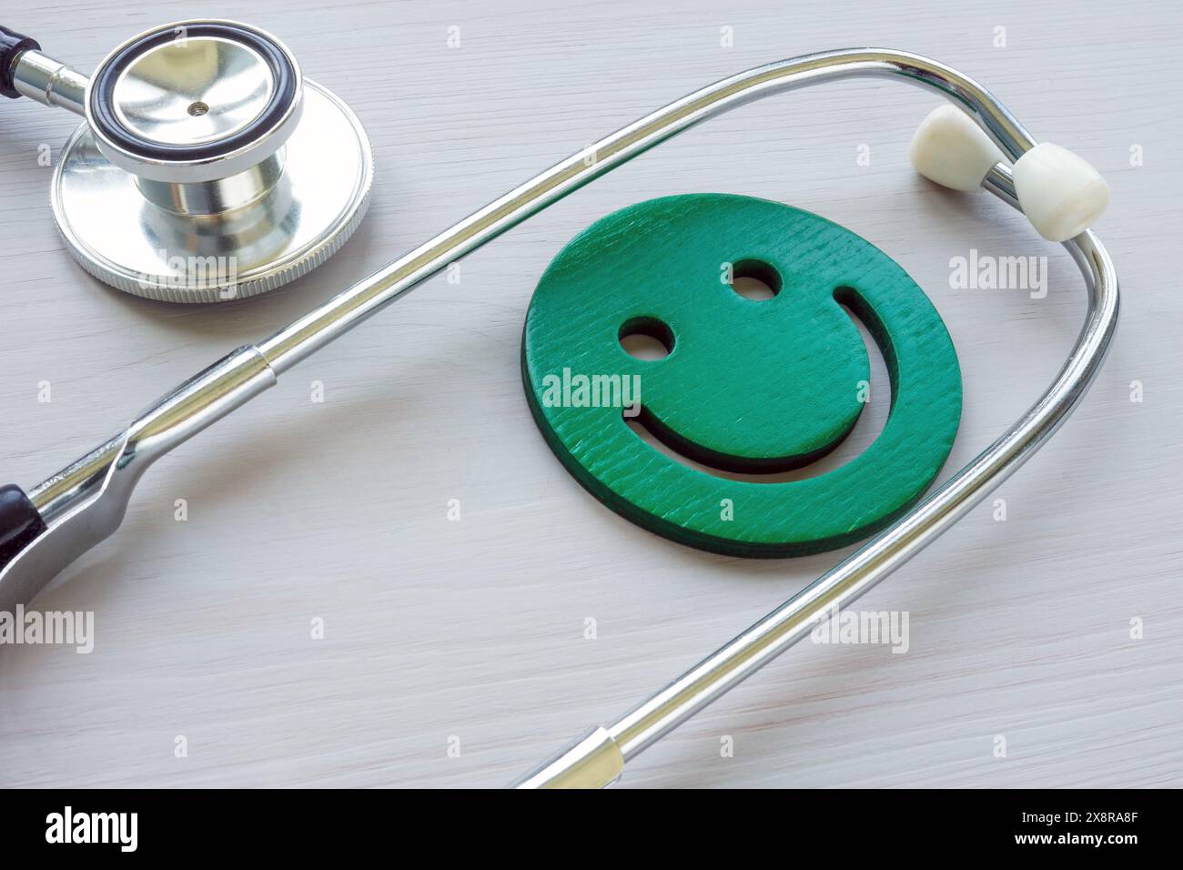 Patient experience or satisfaction concept. Stethoscope and smiley face ...