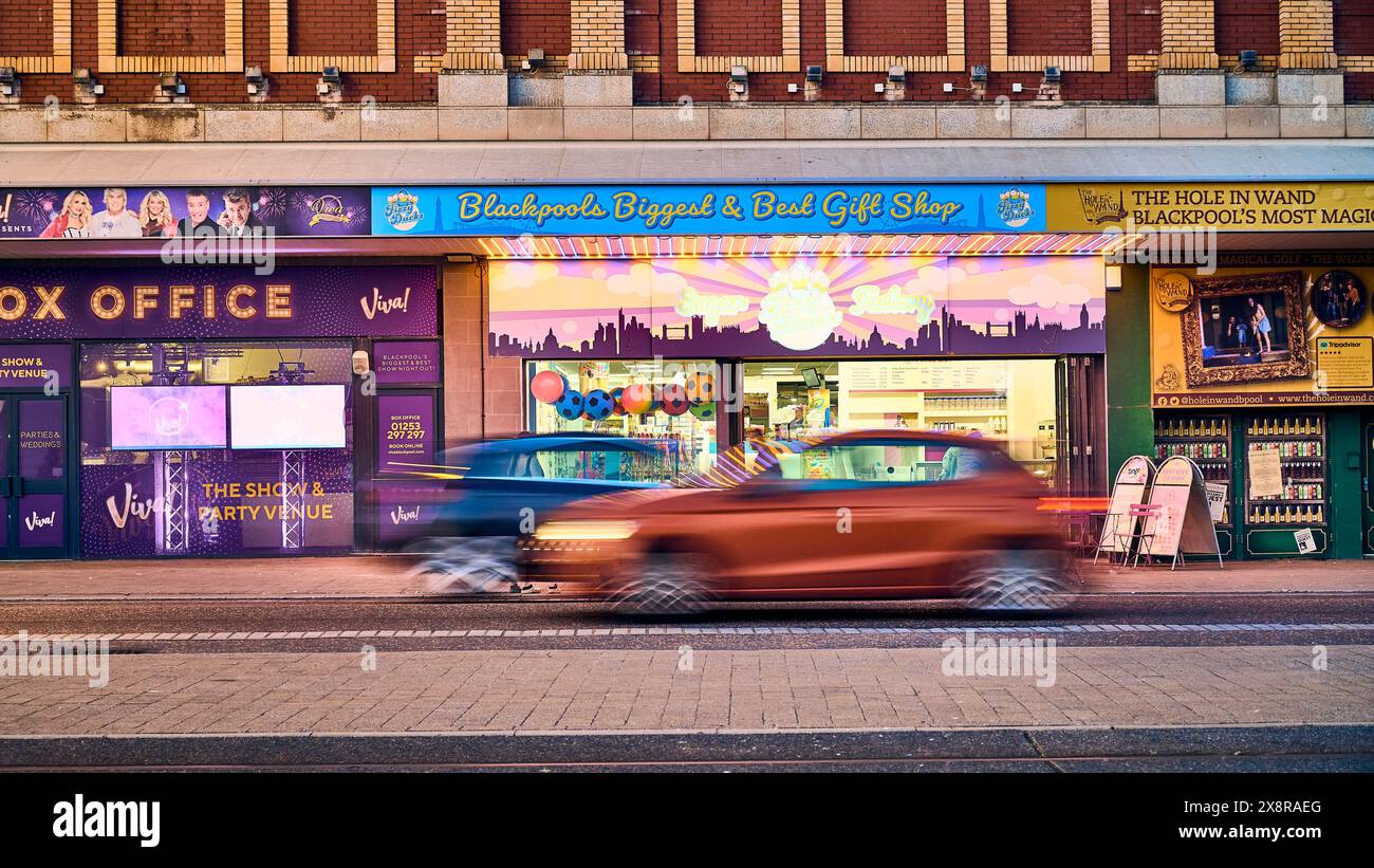 Front of gift shop on Blackpool Promenade at night Stock Photo - Alamy