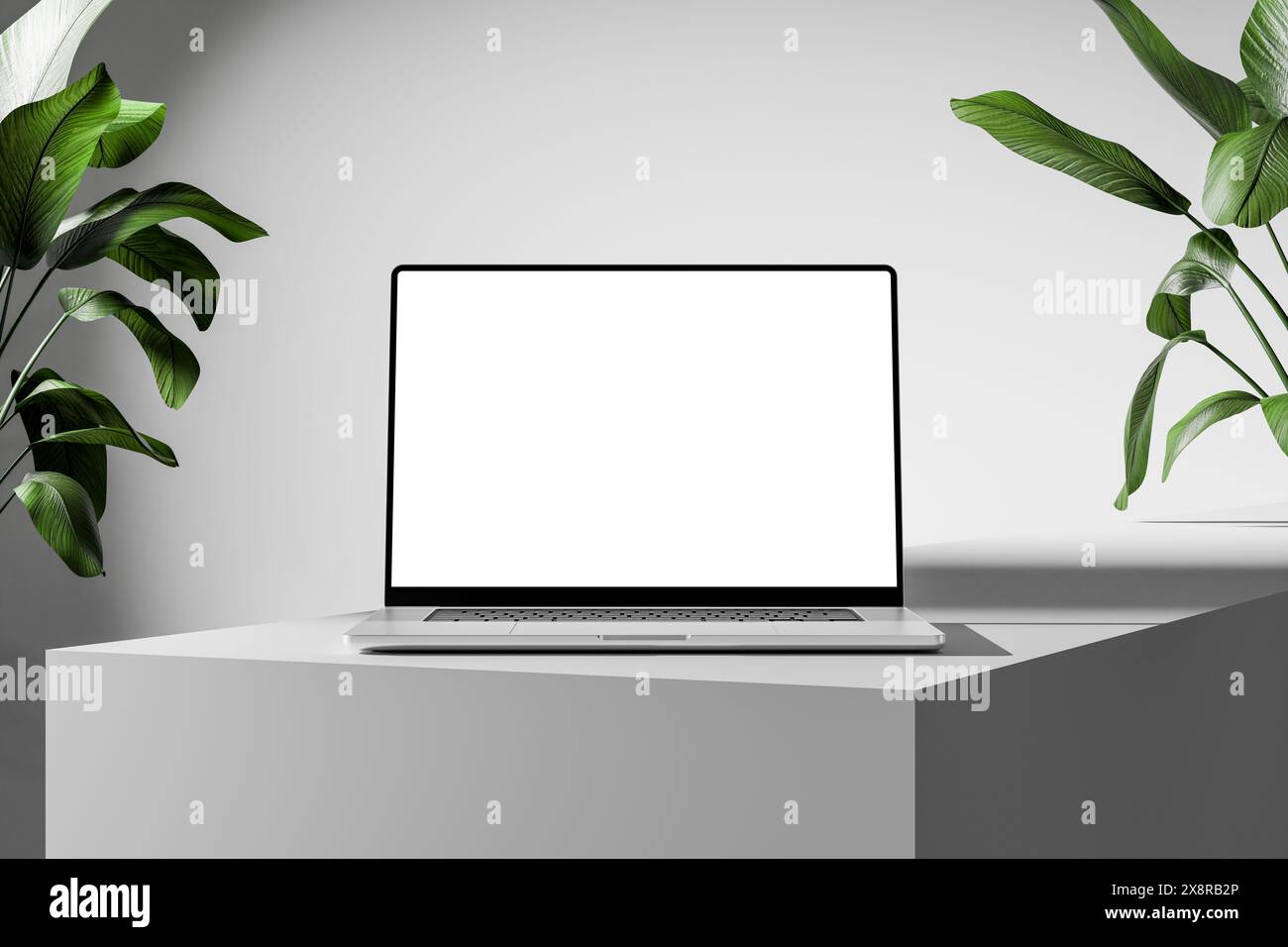 Laptop displaying a blank screen, on a sleek white abstract cube. Green ...