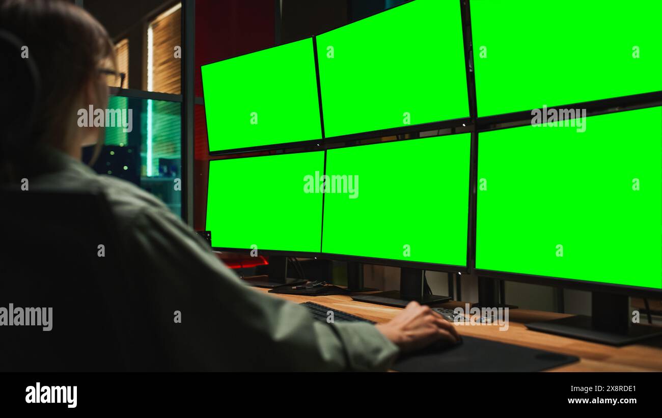 Female Cyber Security Student Coding on Desktop PC With Six Monitors ...