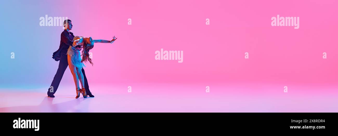 Banner. Artistic male and woman in stage costumes dancing energetic ...