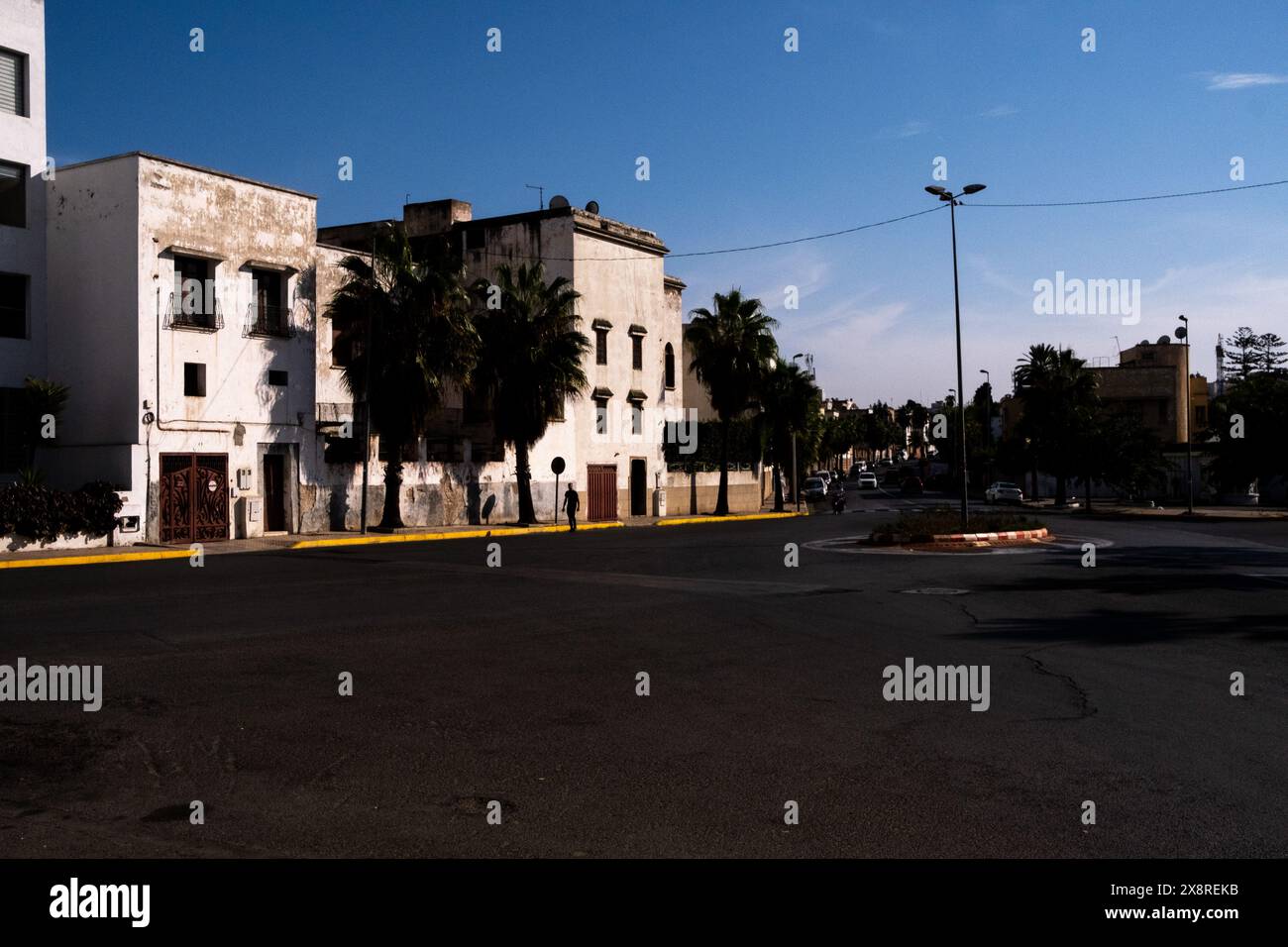 A view of old buildings along a street in the Habous district of ...