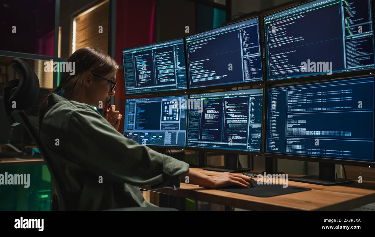 Female Cyber Security Specialist Writing Code On Deskop Computer With