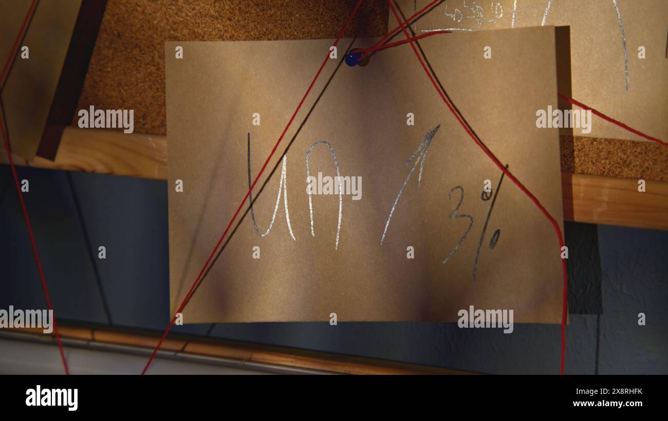 Notes with red thread. Stock footage. Close-up of mysterious notes ...