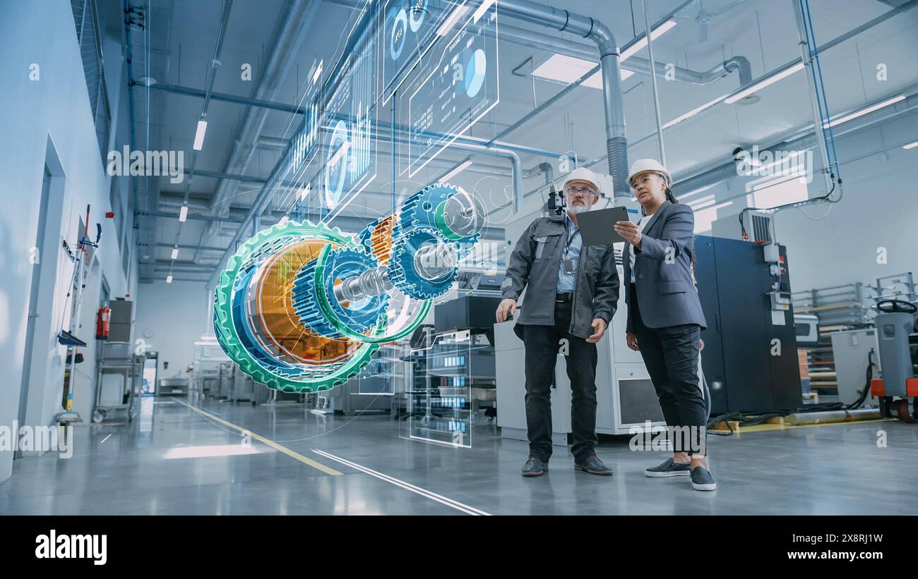 Factory Digitalization: Two Industrial Engineers Use Tablet Computer ...