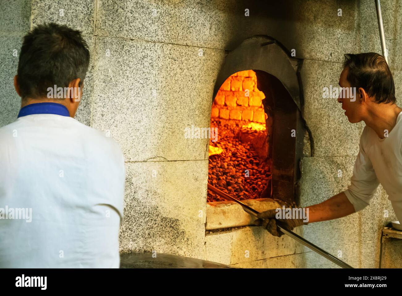 Shiraz, Iran - December 31, 2022: The work of bakers (ovenmans) at the ...