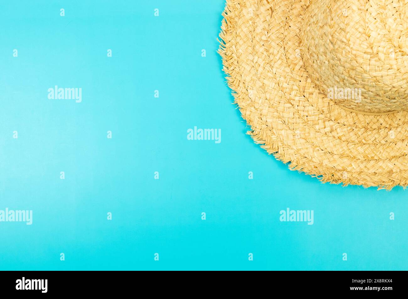 Top view of straw hat on blue background. Summer fashion, vacation and ...