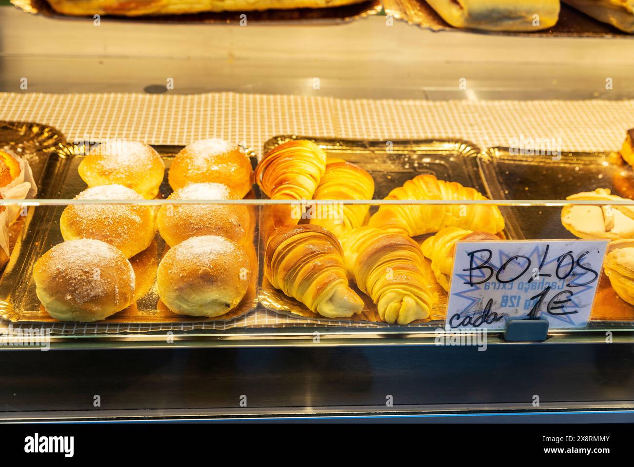 Display of a candy shop with bolos and croissant in Bolhao Market ...