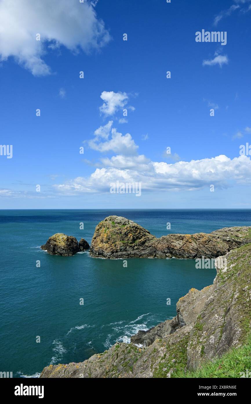 Rocky outcrops and attractive sky on the coast between Porthgain and ...