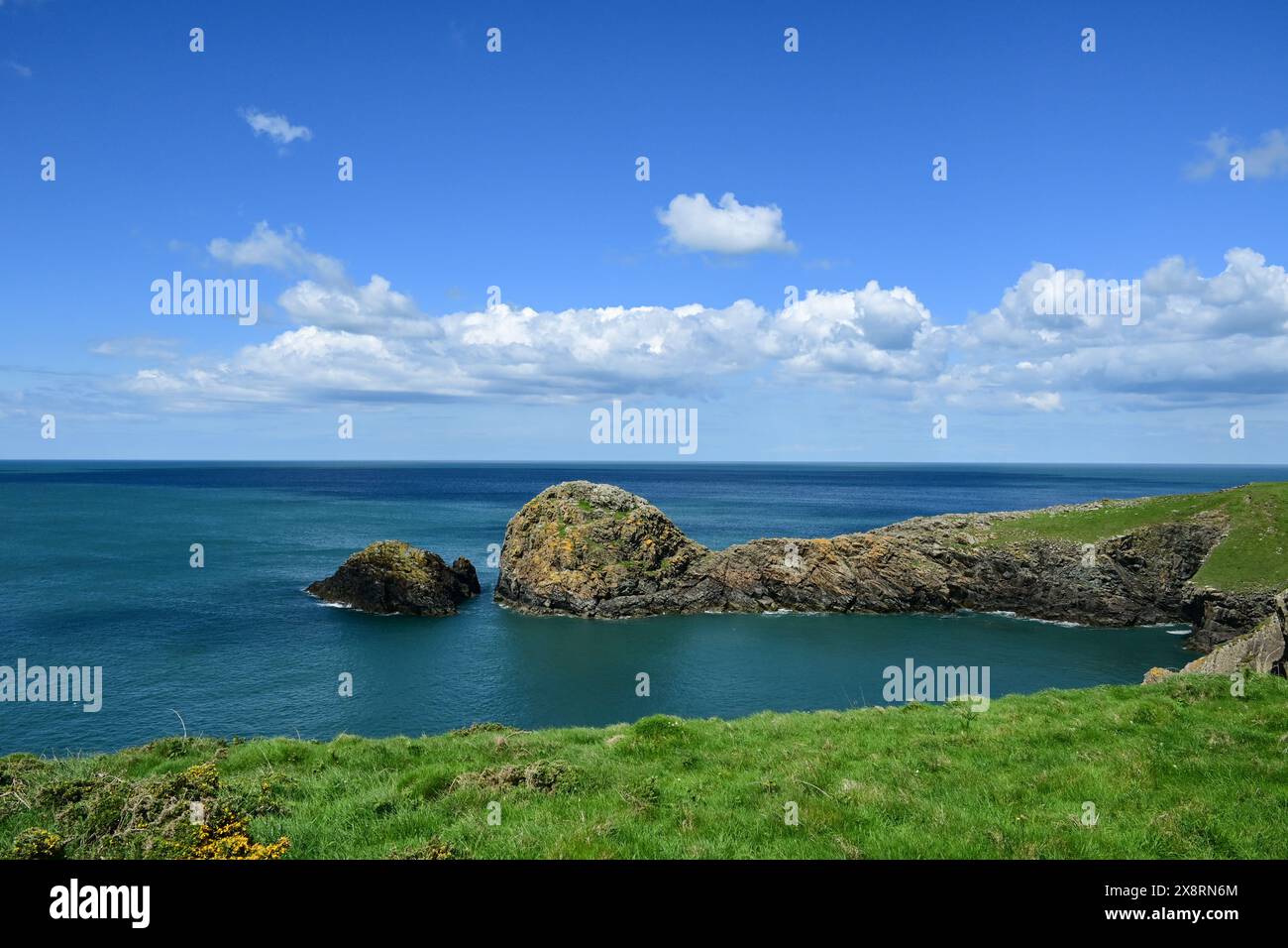 Rocky outcrops and attractive sky on the coast between Porthgain and ...