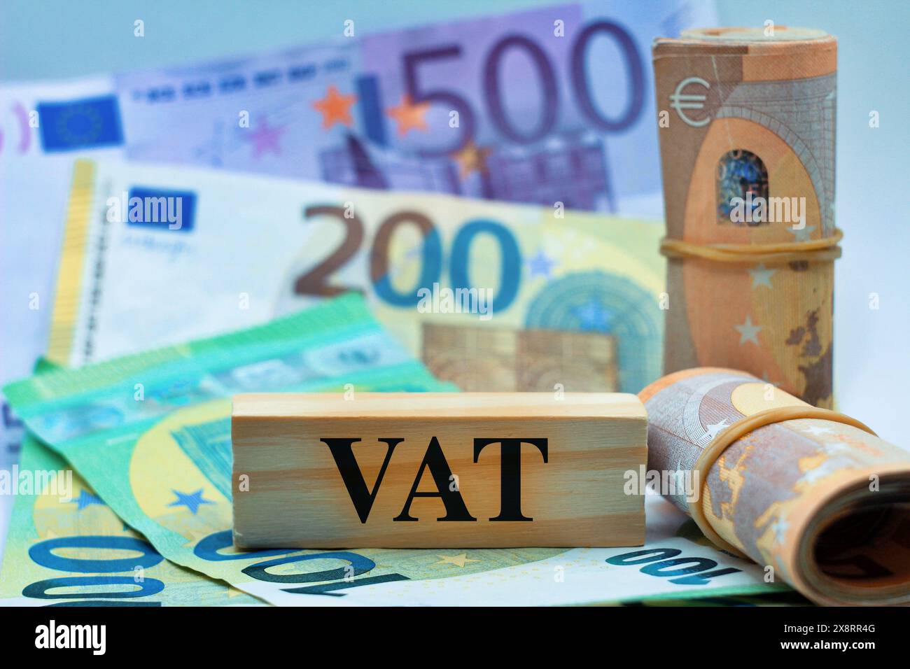 VAT Text on Wood Blocks With euro banknotes as background Stock Photo ...