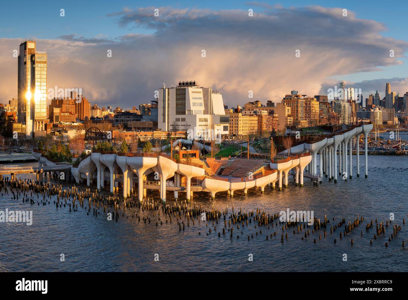 New York City, Little Island public park at sunset. Elevated park with ...