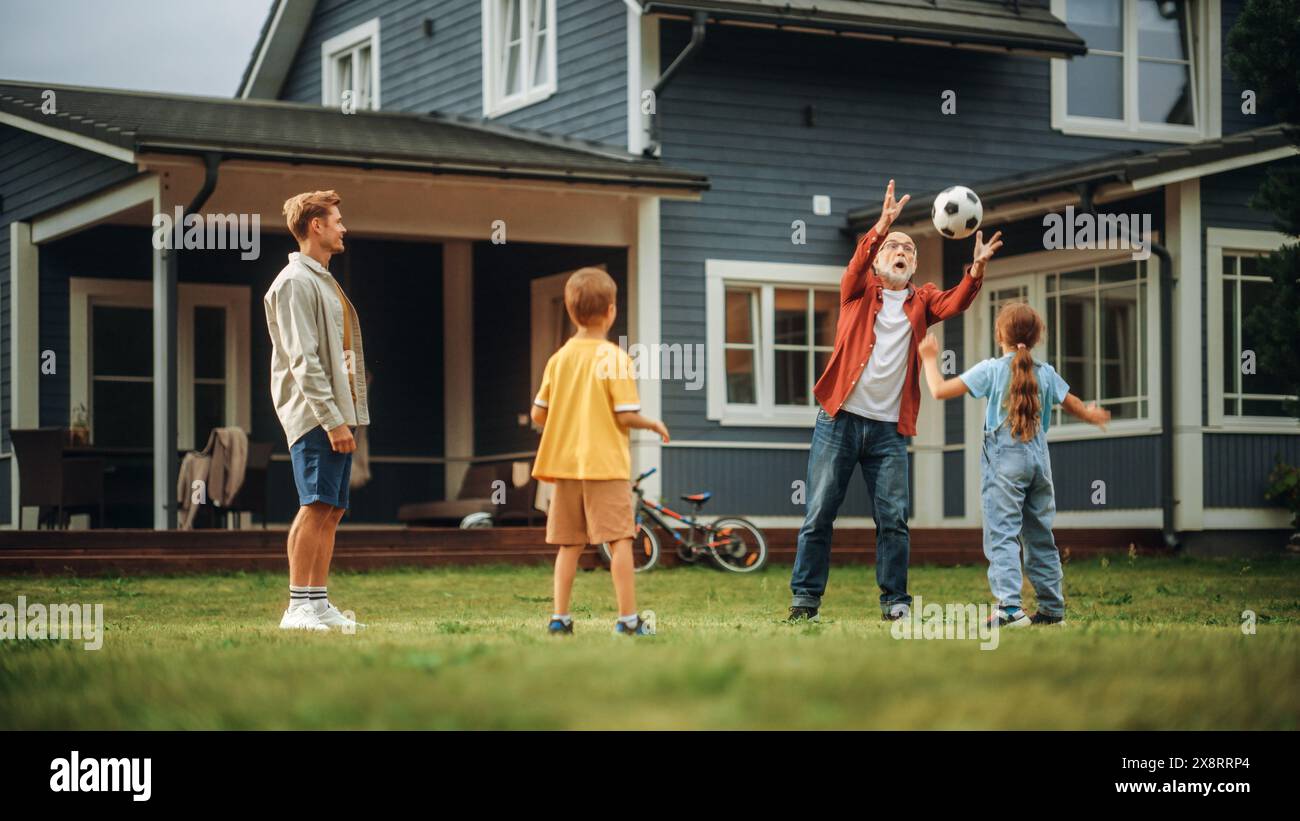Family Spending Leisure Time Outside with Kids, Grandfather Playing ...