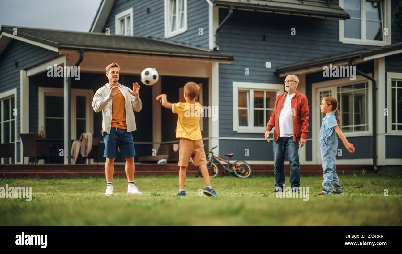 Family Spending Leisure Time Outside with Kids, Grandfather Playing ...