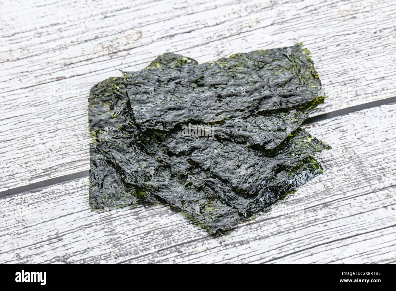 Korean nori seaweed chips heap snack Stock Photo - Alamy