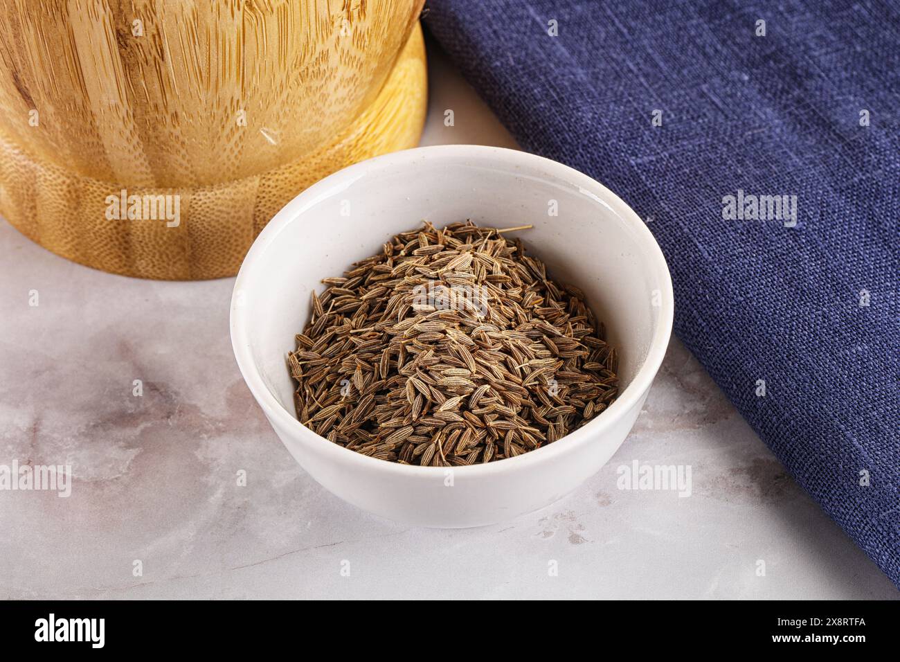 Zeera seeds seasoning in the bowl Stock Photo - Alamy