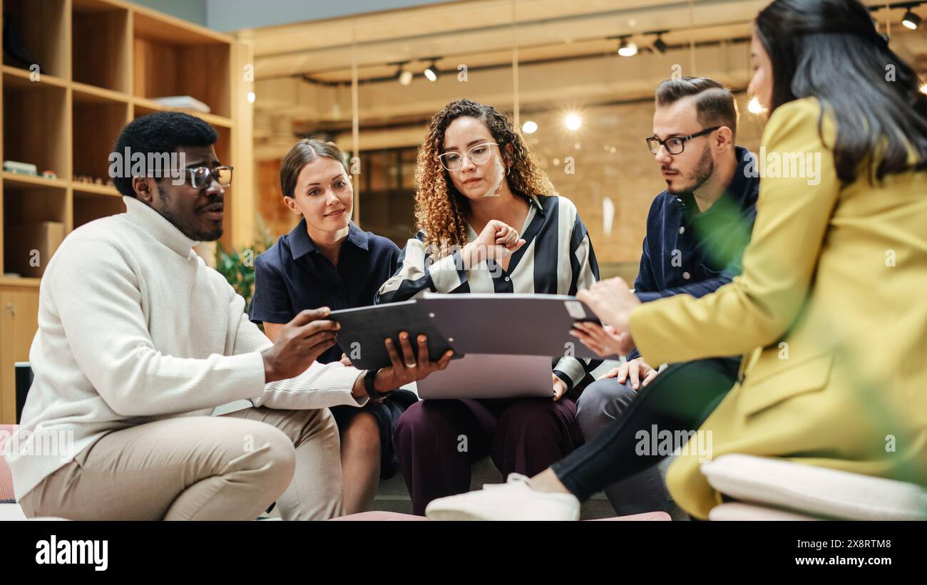Group of People from Multiple Ethnicities Working on Problem Solving ...