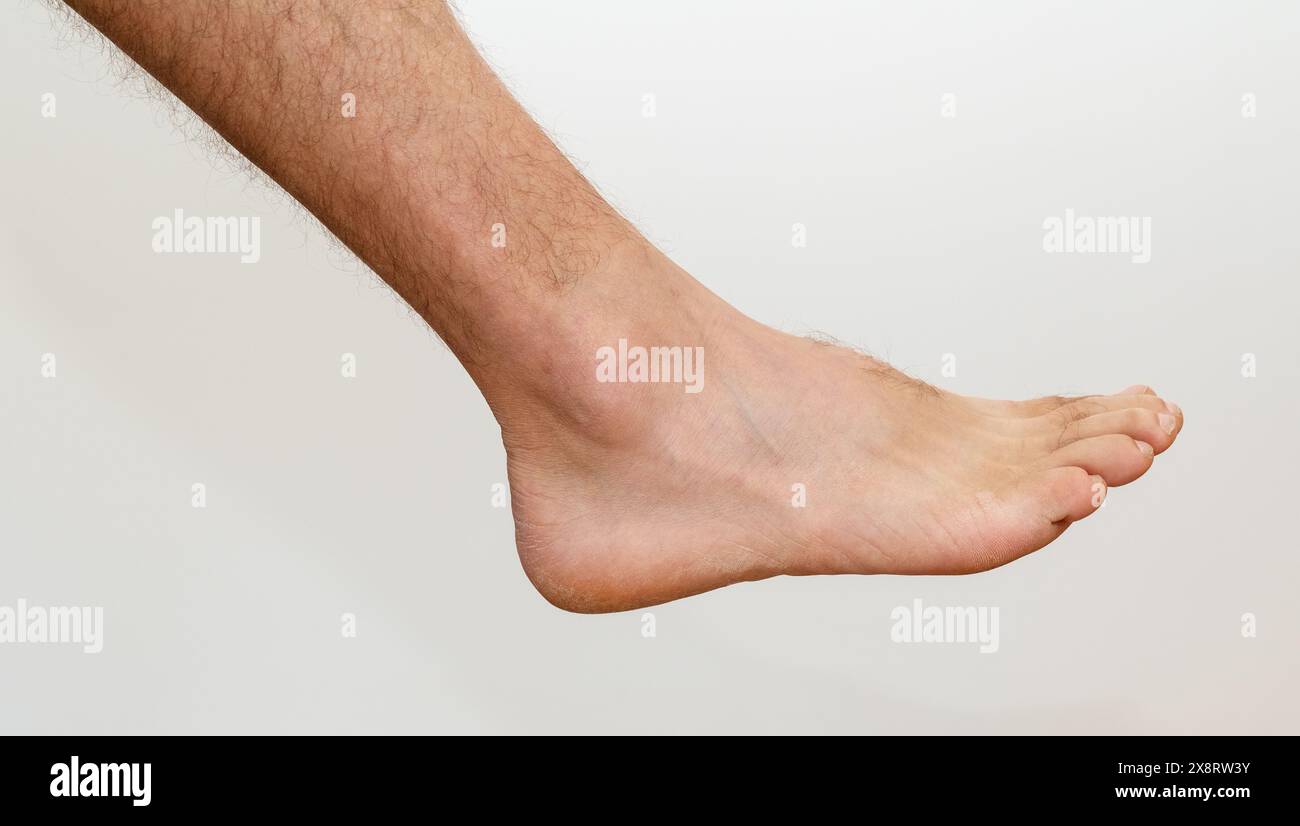 Outer side of male foot on plain white background. Graphic resource of ...