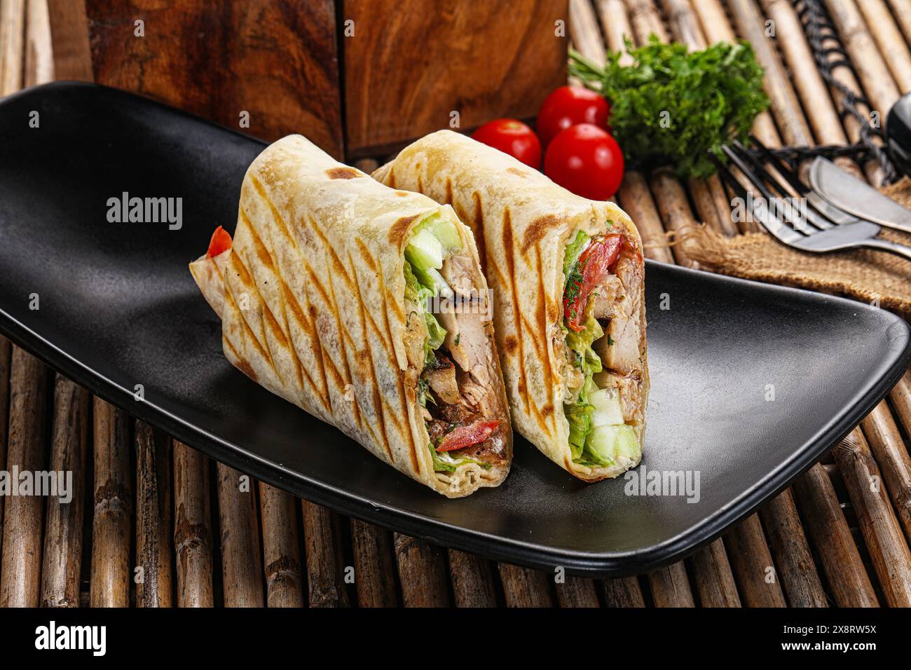 Chicken doner wrap with meat and vegetables Stock Photo - Alamy