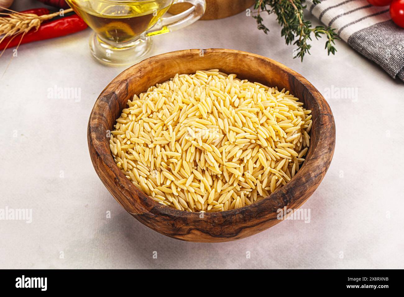 Italian raw dry pasta risoni for cooking Stock Photo - Alamy