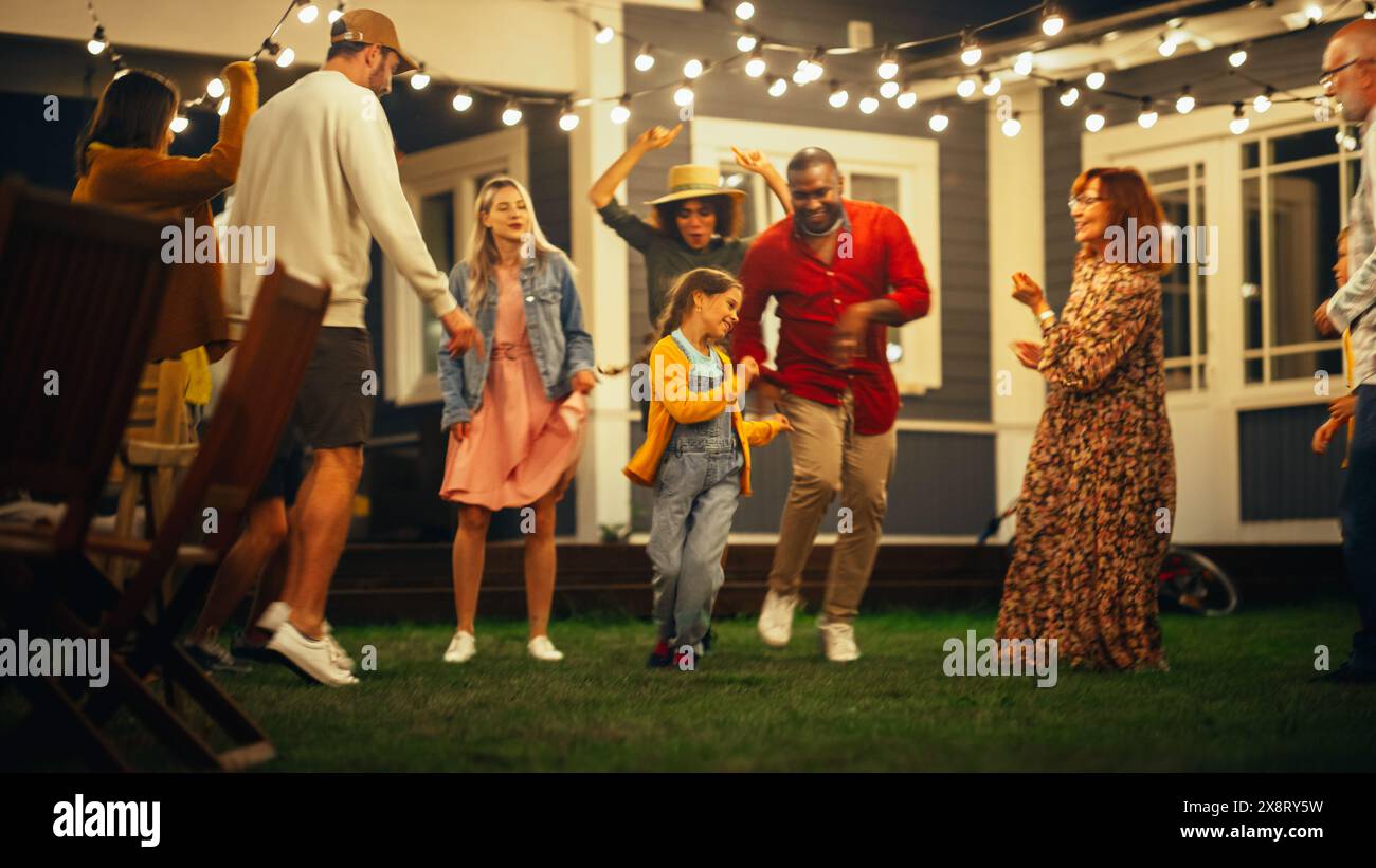 Diverse Multicultural Friends and Family Dancing Together at an ...