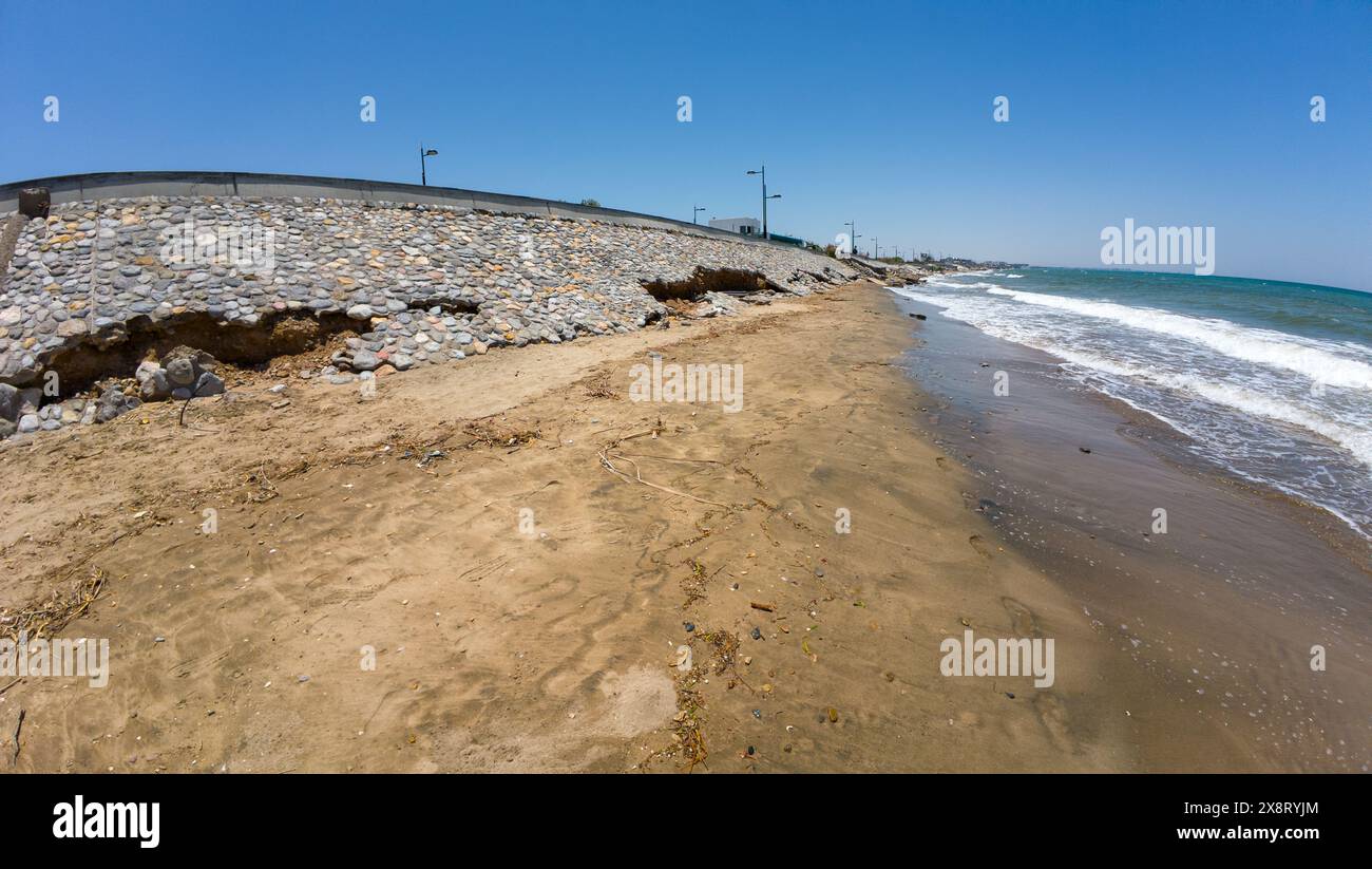 Photography of eroded stone wall near a beach and sea in Oman Muscat ...