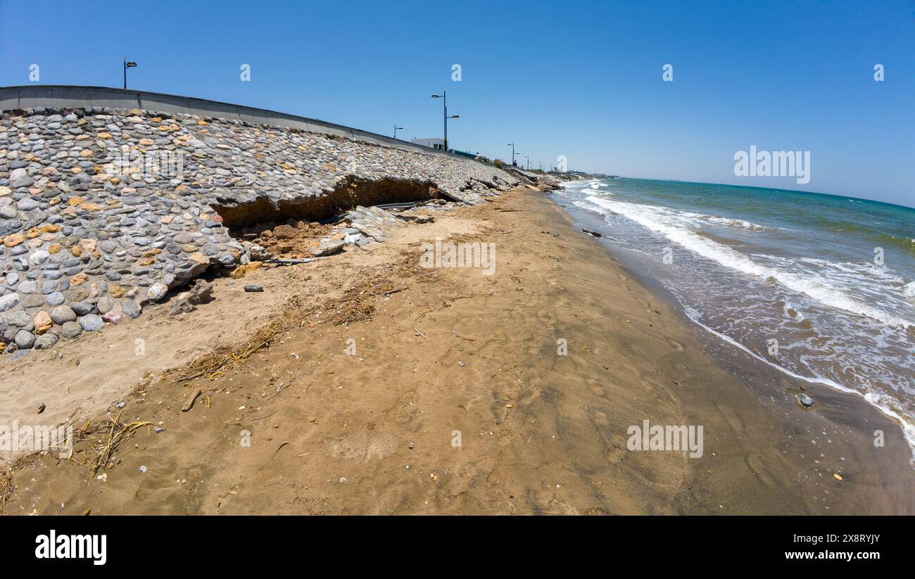 Photography of eroded stone wall near a beach and sea in Oman Muscat ...