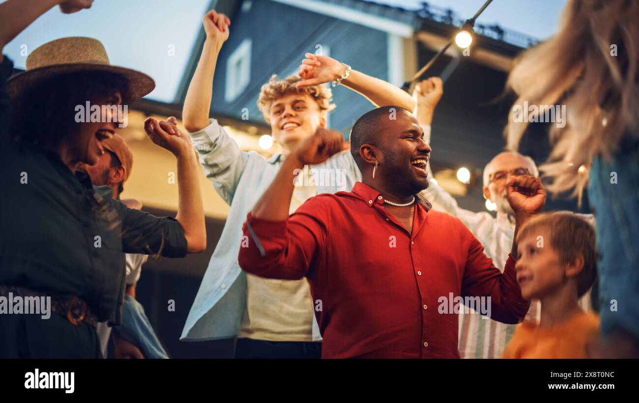 Parents, Children and Multicultural Friends Dancing Together at a ...