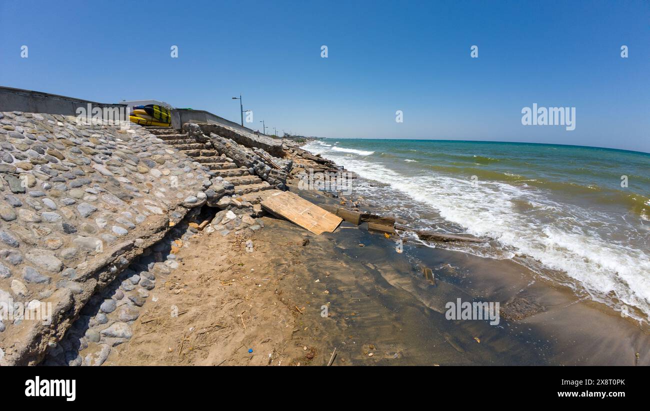 Photography of eroded stone wall near a beach and sea in Oman Muscat ...