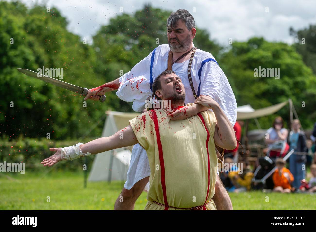 Chalfont, UK. 27 May 2024. Gladiators (with fake blood) take part in ...