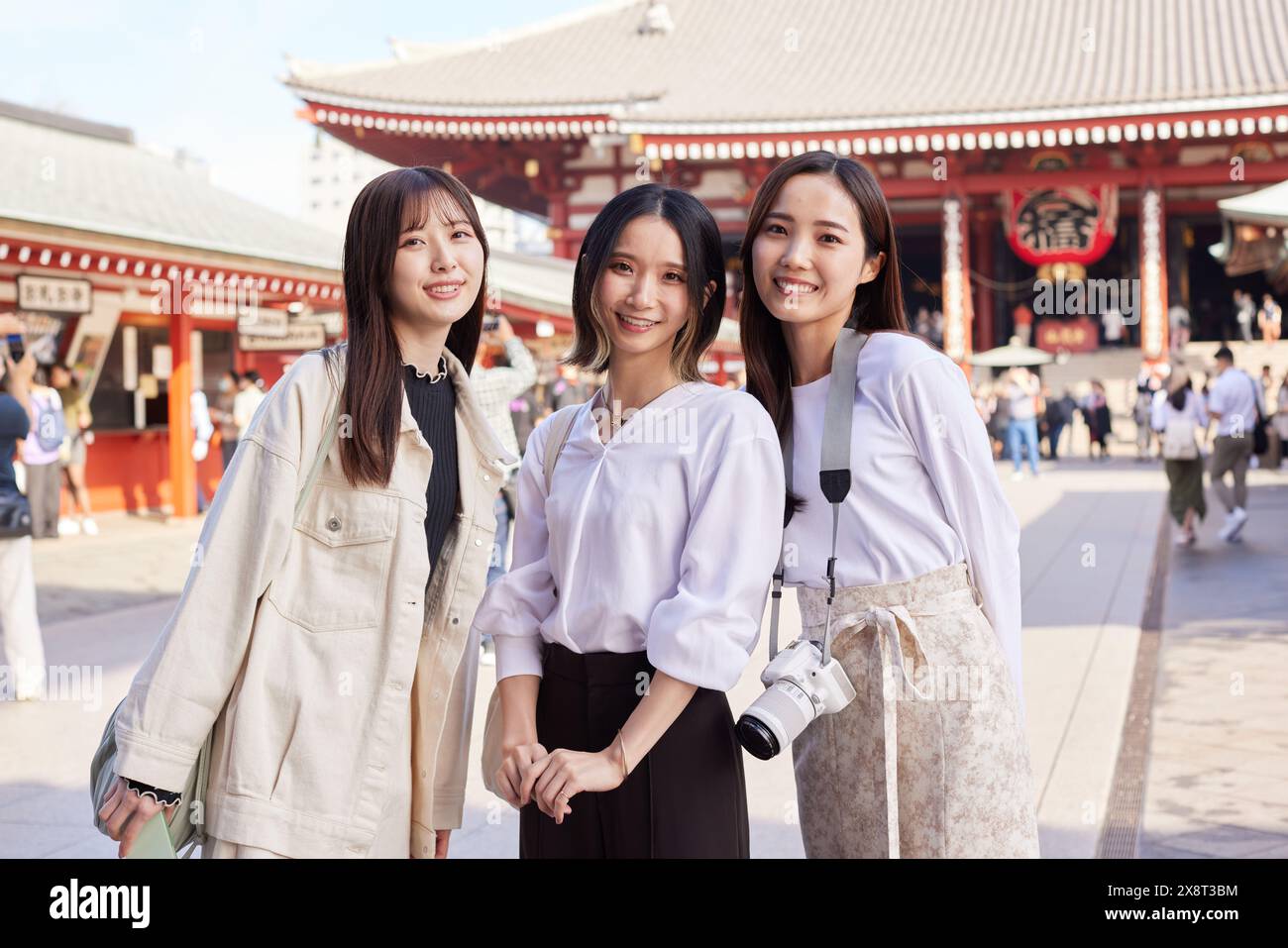 Japanese friends visiting traditional temple in Tokyo Stock Photo - Alamy