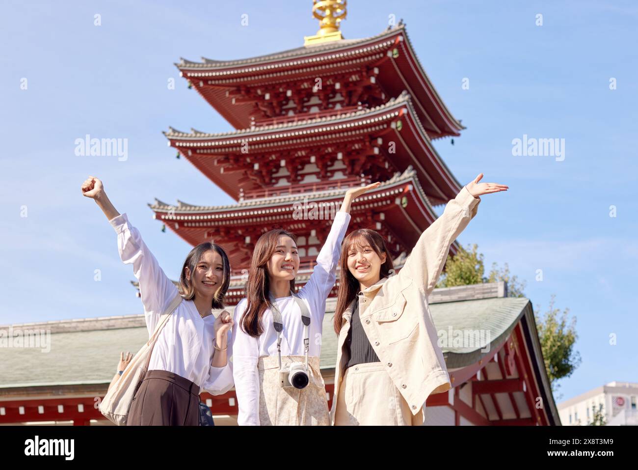 Japanese friends visiting traditional temple in Tokyo Stock Photo - Alamy