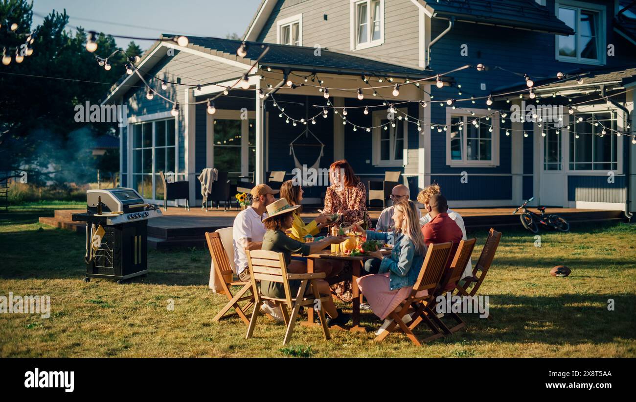 Parents, Children, Relatives and Friends Having an Open Air Barbecue ...