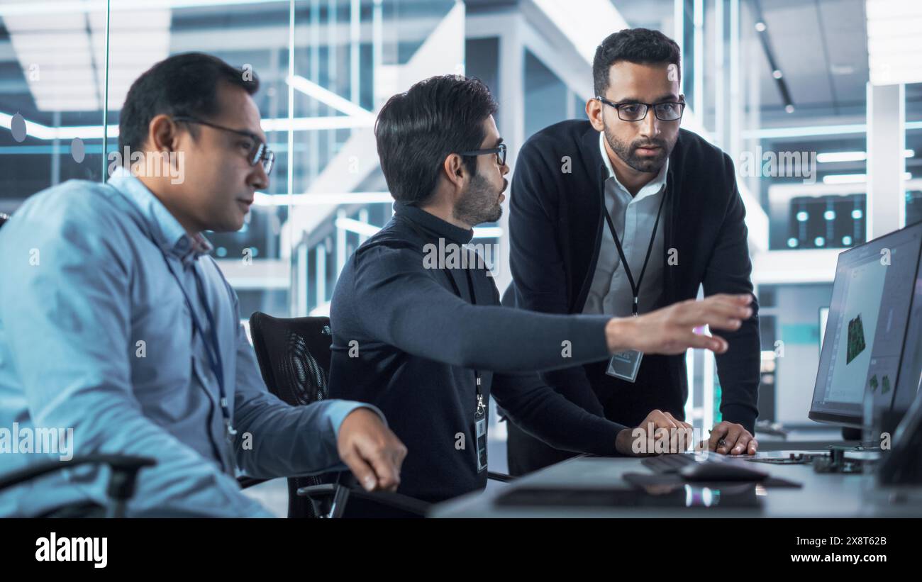 Team of Three Industrial Design Agency Specialists Discussing a 3D ...