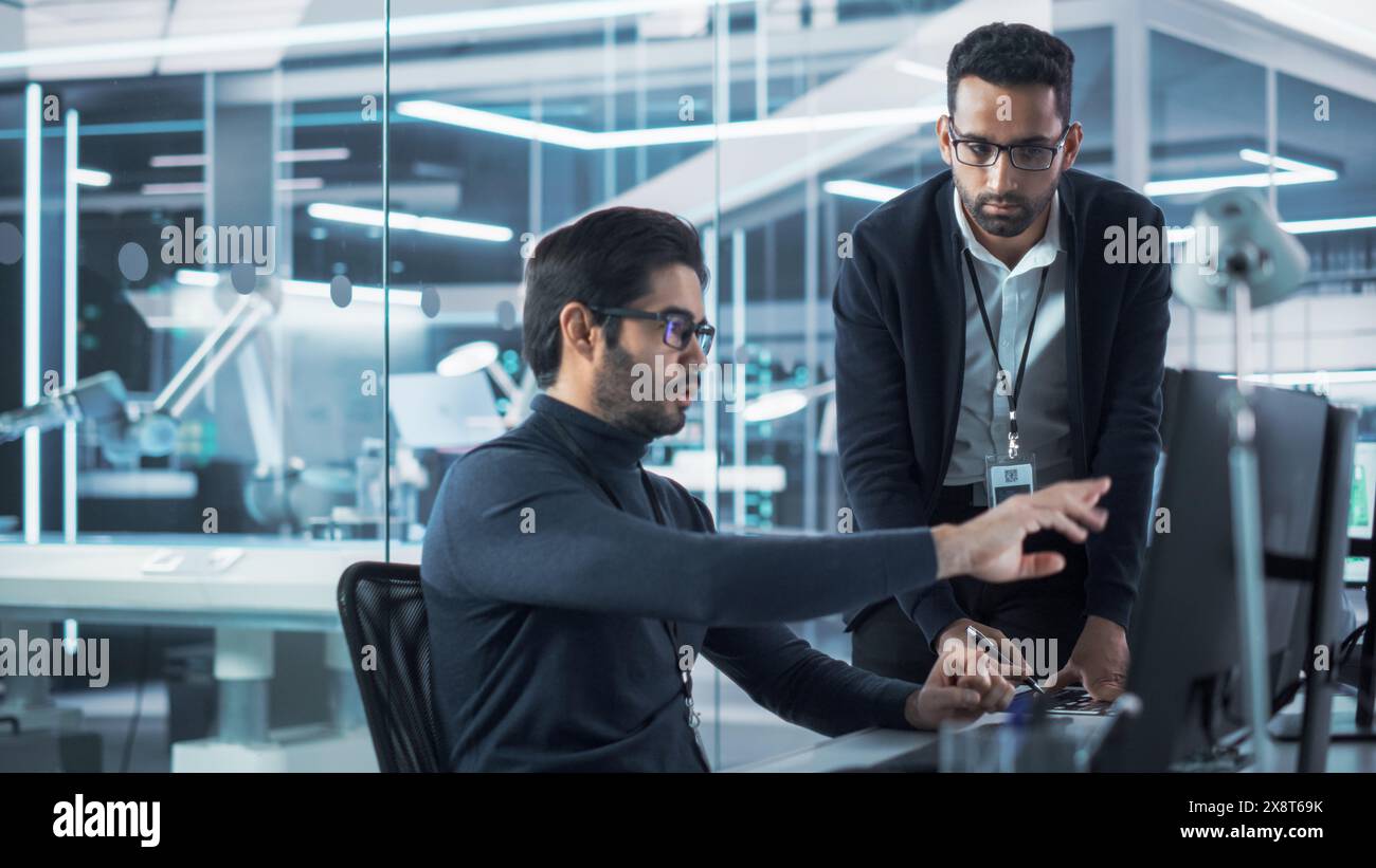 Portrait of Two Young Multiethnic Software Interface Programmers ...