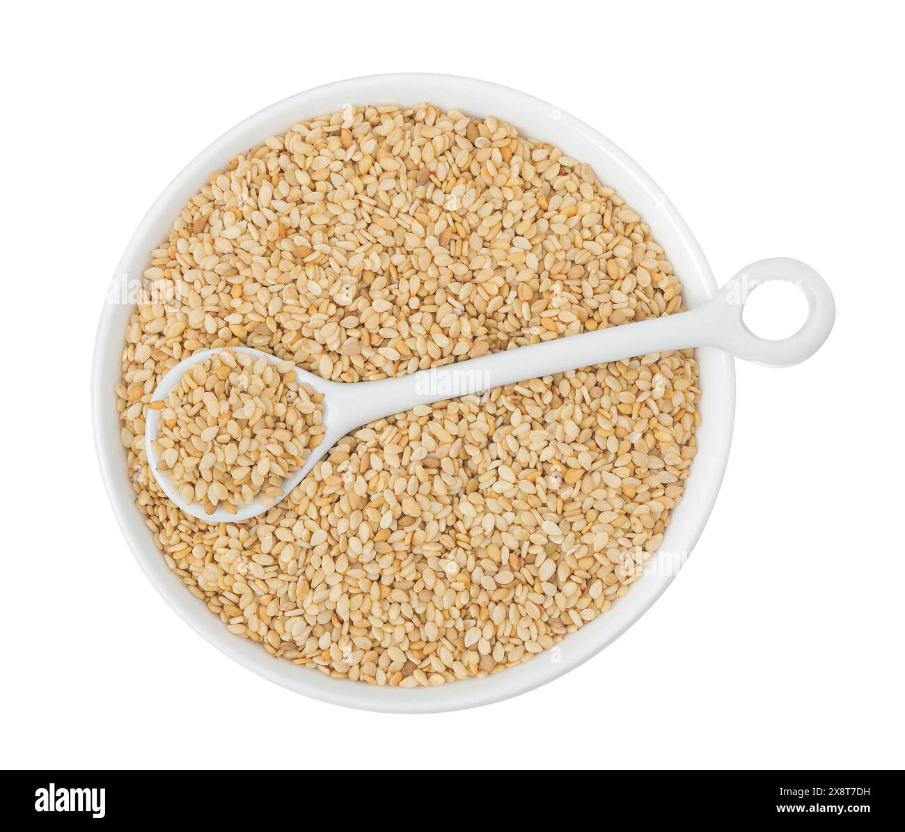 Sesame seeds in ceramic bowl isolated on white background. Top view ...