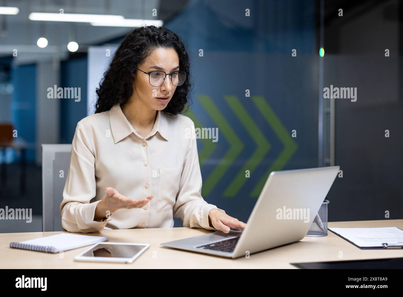 Upset disappointed latin american woman at workplace inside office ...