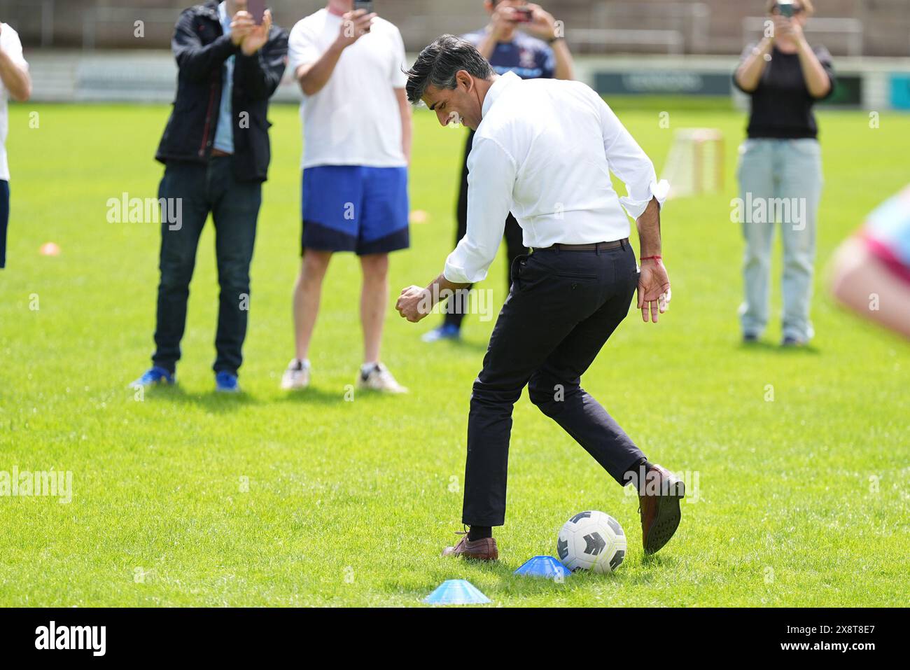 Prime Minister Rishi Sunak during his visit to Chesham United Football ...