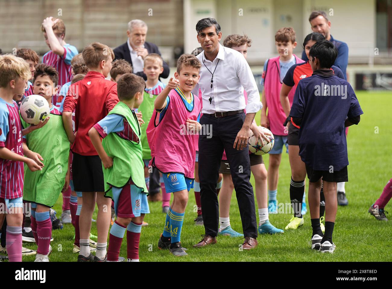 Prime Minister Rishi Sunak during his visit to Chesham United Football ...