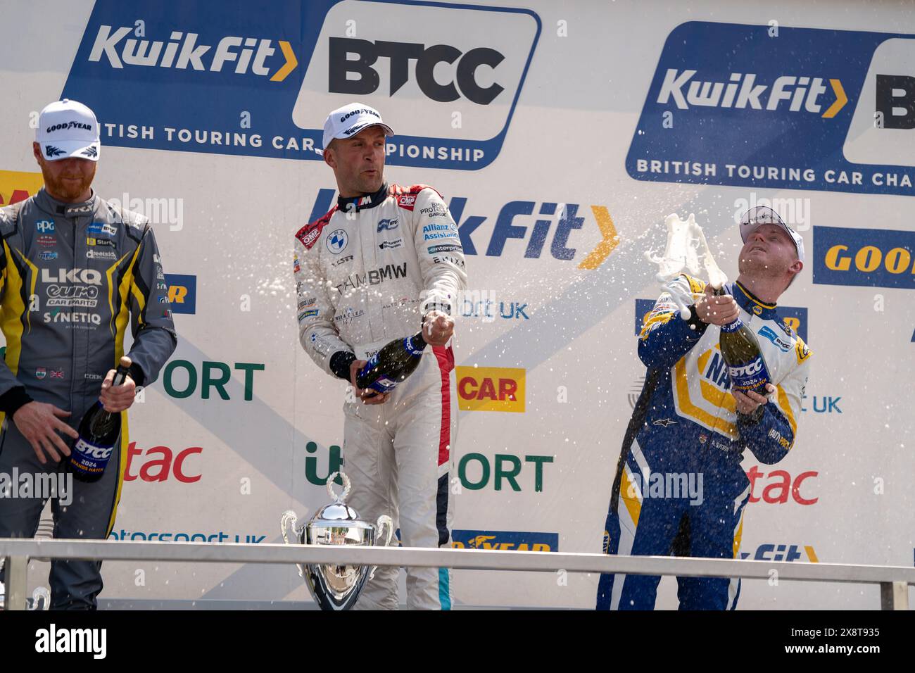 Colin Turkington with Josh Cook and Ash Sutton spray champagne Round 4 ...