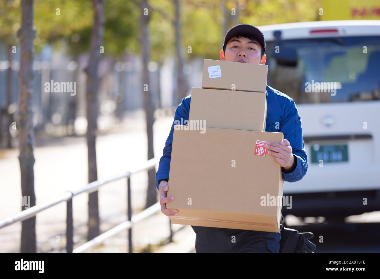 Car carrying japanese man hi-res stock photography and images - Alamy