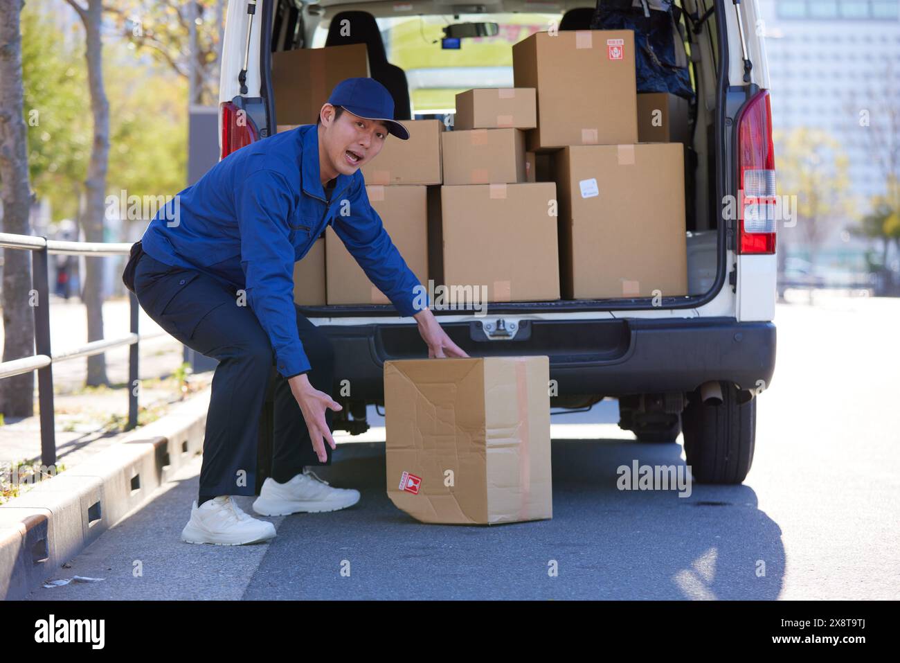 Car carrying japanese man hi-res stock photography and images - Alamy