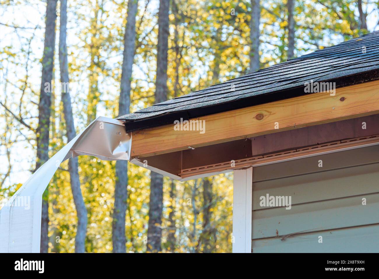 Damaged aluminum fascia trim exposed wood after hurricane storm Stock ...
