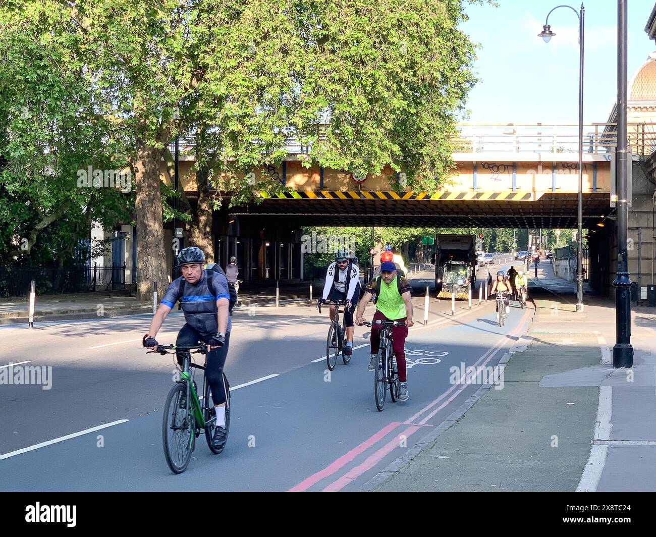 London, UK. 20th May, 2024. Cyclists out on a cycle path on Grosvenor ...