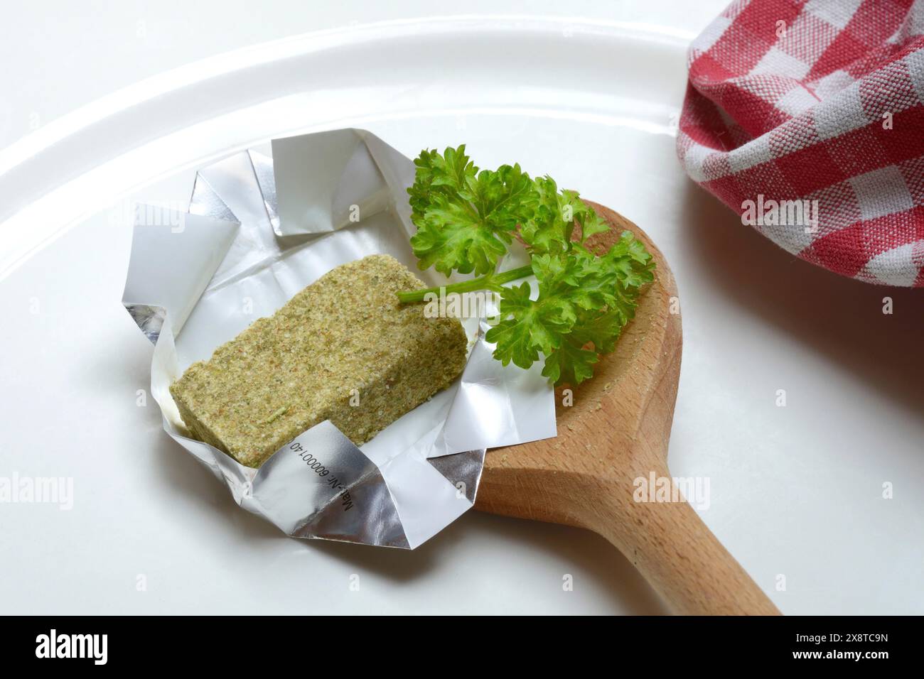 Stock cube with cooking spoon, soup cube Stock Photo - Alamy