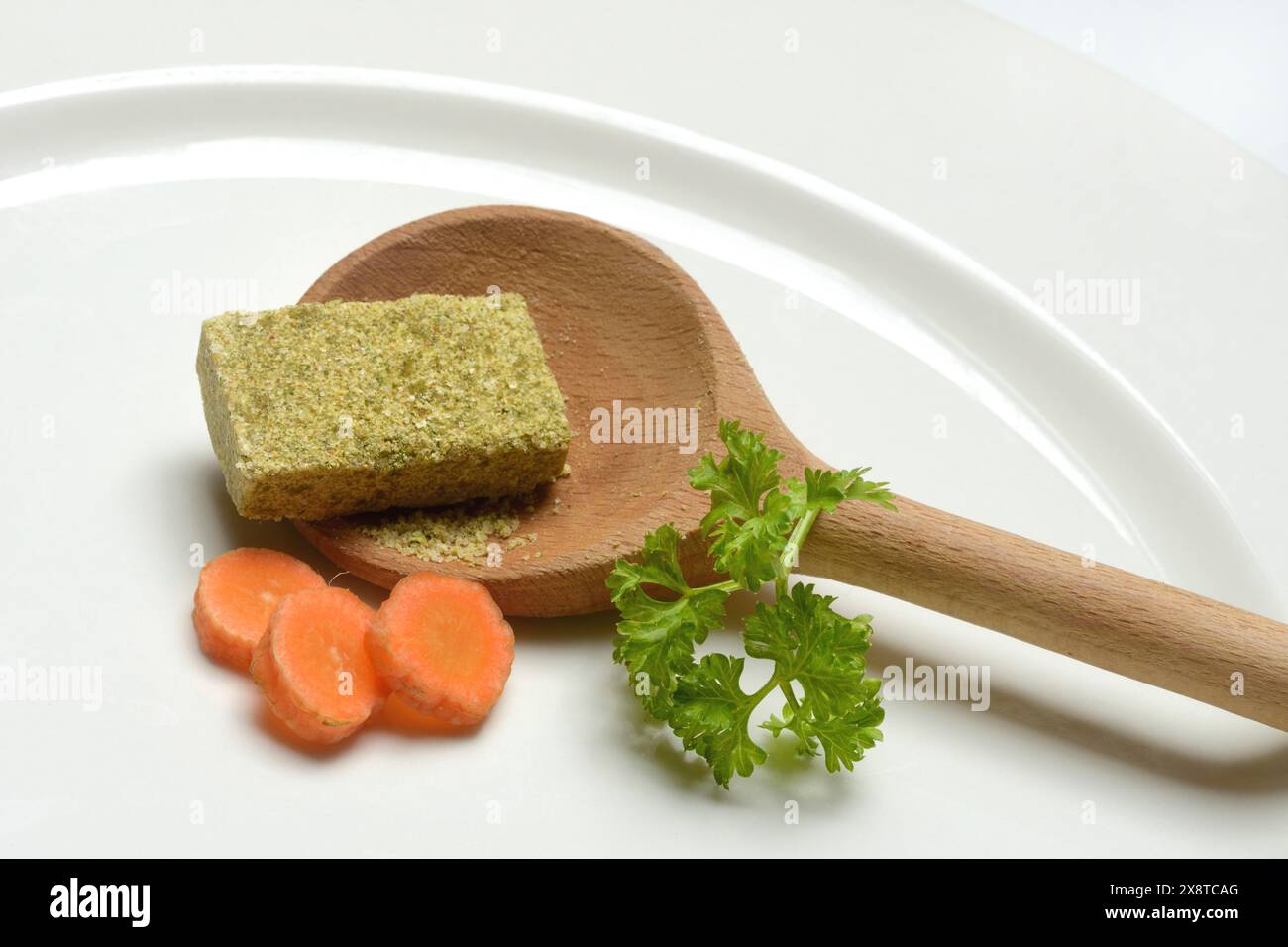 Stock cube with cooking spoon, soup cube Stock Photo - Alamy