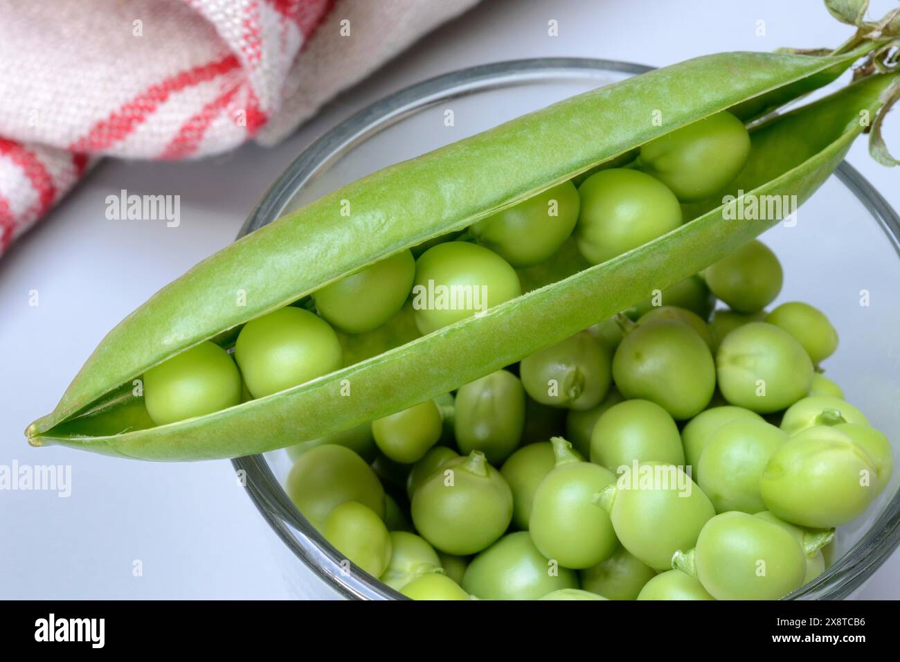 Fresh green peas in shell and pea pod, Pisum sativum Stock Photo - Alamy