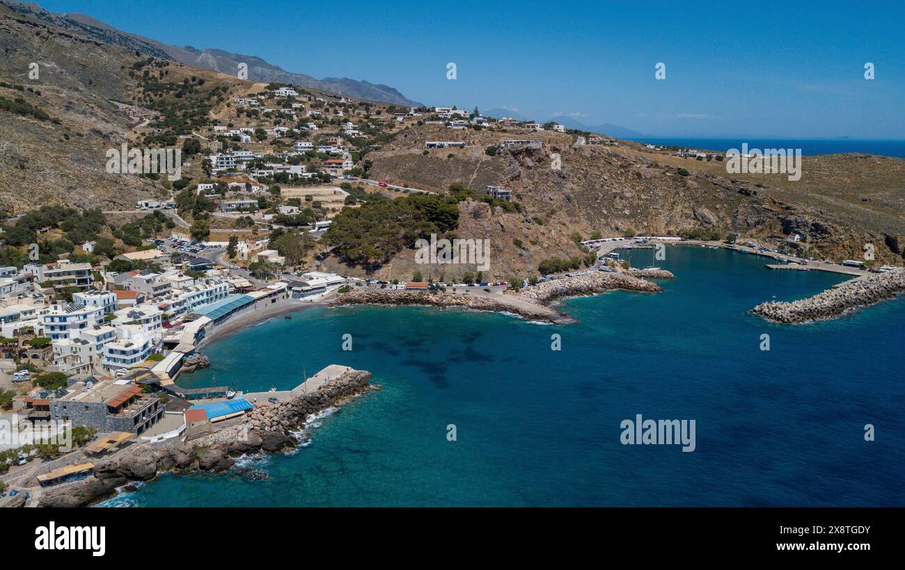 Aerial view of bay with harbour of Chora Sfakion on the south coast of ...