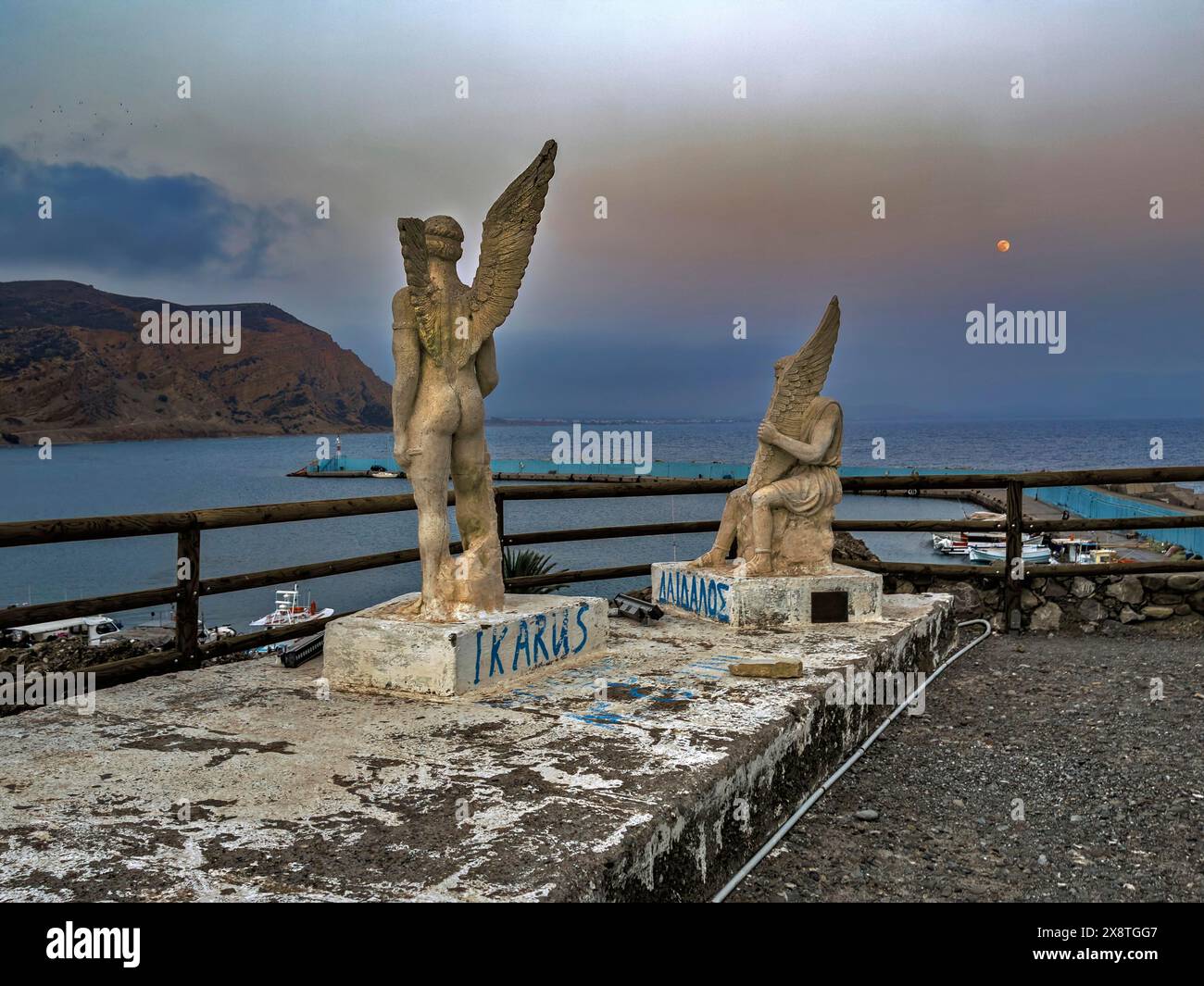 Photo taken at dusk evening mood of monument to Daedalus and Icarus on ...