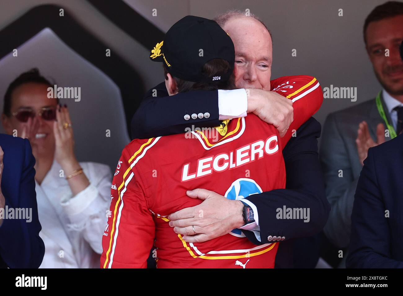 HSH Prince Albert II of Monaco (R) embraces Charles Leclerc of Scuderia ...